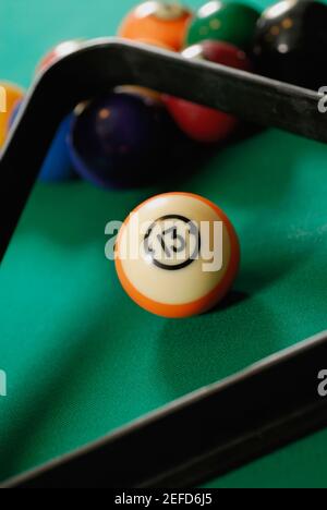 A vertical selective shot of a billiard ball on the pool table Stock ...
