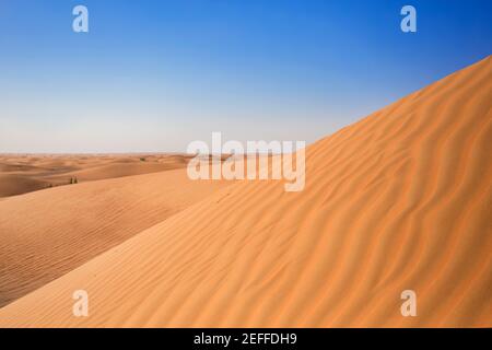 Dubai desert sand hills with wavy sand texture, nature background Stock ...