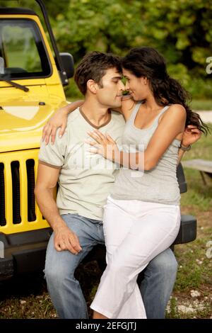 Romantic couple rubbing nose each other Stock Photo - Alamy