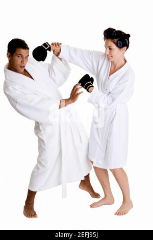 Side profile of a young couple sparring Stock Photo - Alamy