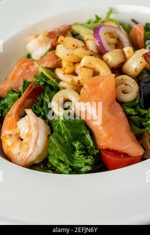 Seafood appetizer. Octopus salad cooking process. Mediterranean ...