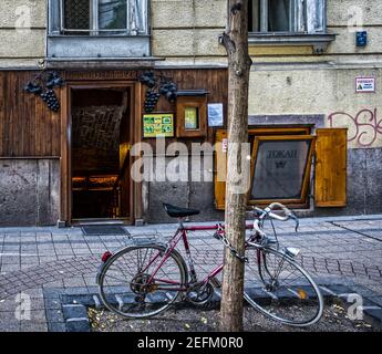 Bicycle parked in front of a stone wall in Monterosso (Cinque Terre) in ...