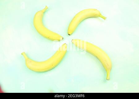 ripe little banana on a white background Stock Photo - Alamy