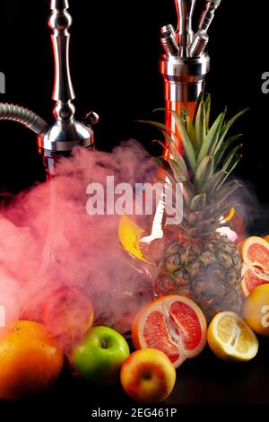 Fruit flavor hookah isolated on black background Stock Photo - Alamy
