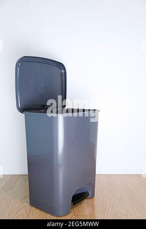 Grey open garbage bin isolated on white background with clipping path ...