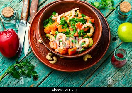 Delicious salad with tamarillo,avocado,shrimp and nuts.Prawn salad with ...