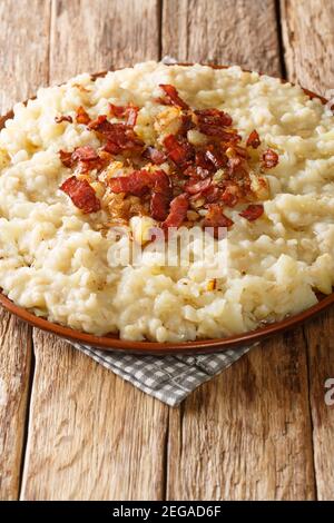 Estonian mashed potatoes with barley Mulgipuder closeup in the plate on ...