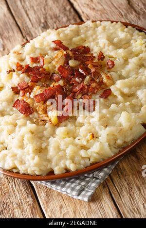 Estonian mashed potatoes with barley Mulgipuder closeup in the plate on ...