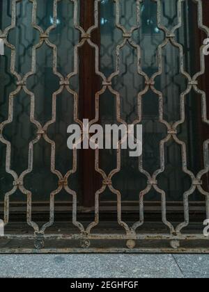 old metal lattice window in the wall Stock Photo - Alamy
