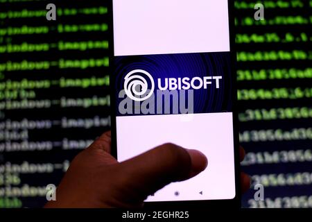 In this photo illustration, a Ubisoft logo is seen displayed on TV ...