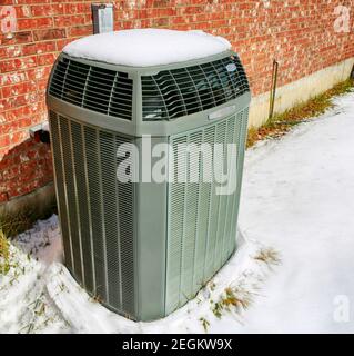 Yellow air conditioner radiator Stock Photo - Alamy