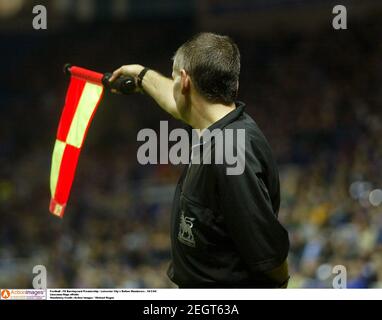 The linesman flags for offside Stock Photo - Alamy