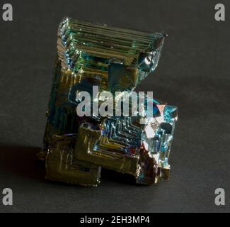 The distinctive stair-stepped crystals of metallic Bismuth. The ...