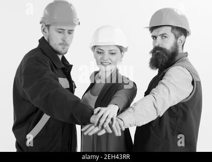 Builders and engineer work together. Management concept Stock Photo - Alamy