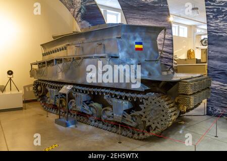 A Sherman BARV (Beach Armoured Recovery Vehicle) and Sherman tanks of ...