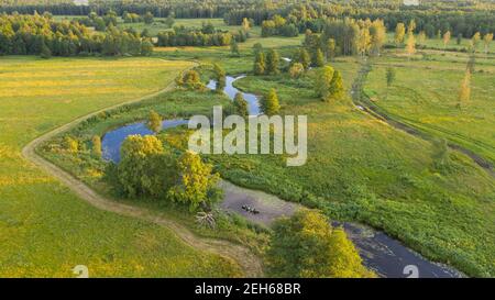 Aerial shot of beautiful Karula National Park full of lakes in Estonia ...