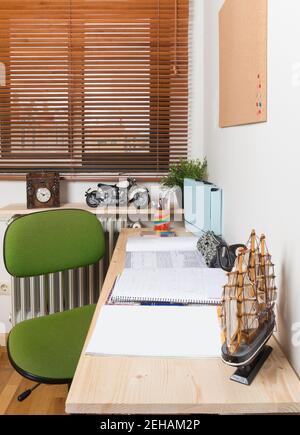 Wooden boat without people with green lake water reflection, row boat ...