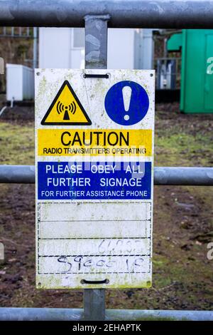 Caution warning radio transmitter radiation danger signs on mobile ...