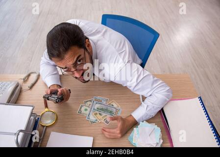 Angry bookkeeper in bankruptcy concept Stock Photo - Alamy