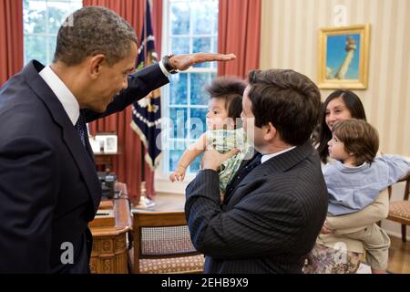 President Barack Obama plays with Katia Wolfsthal, daughter of ...