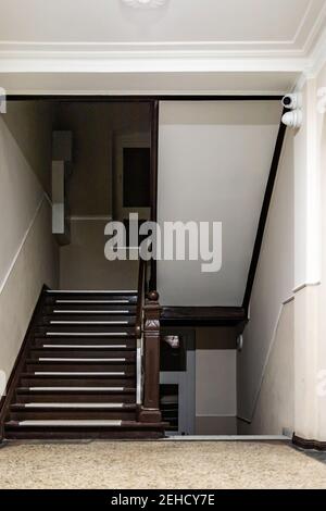Dark staircase in an apartment building Stock Photo - Alamy