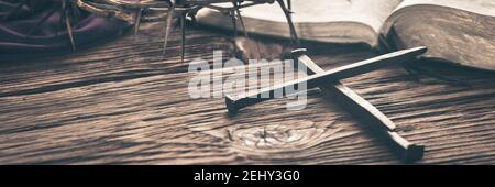 Three Crucifixion Spikes In Shape Of Cross On Wooden Table With Bible ...
