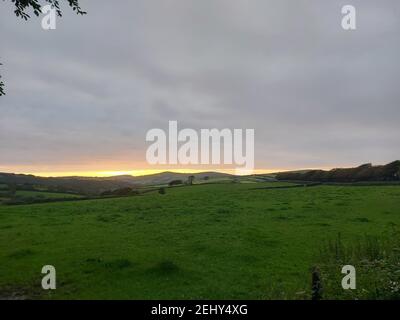 Views over Exmoor at sunset Stock Photo - Alamy