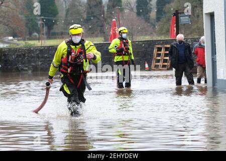 Fire service pumping out flooded cellar using AWG Ejector pump Stock ...