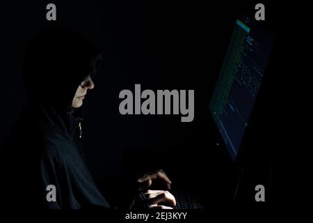 hacker coding at night cybersecurity concept Stock Photo - Alamy