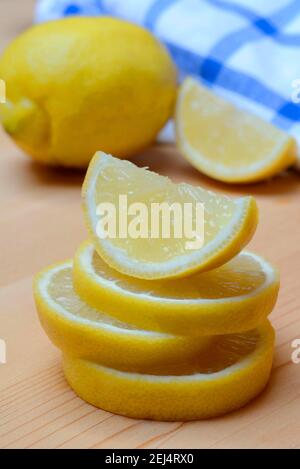 Lemon quarter slice (Citrus limon) isolated on white Stock Photo - Alamy