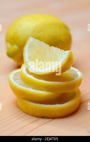 Lemon quarter slice (Citrus limon) isolated on white Stock Photo - Alamy