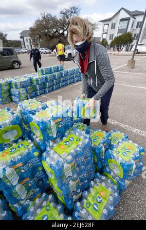Texas state Rep. Vikki Goodwin pulls her kayak during a trip to view large buoys being used as a ...