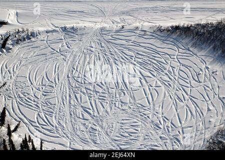 Aerial view of snowmobile tracks Stock Photo - Alamy