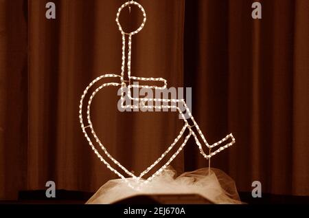 A handicap symbol with a heart replacing the wheel. Love wheelchair ...