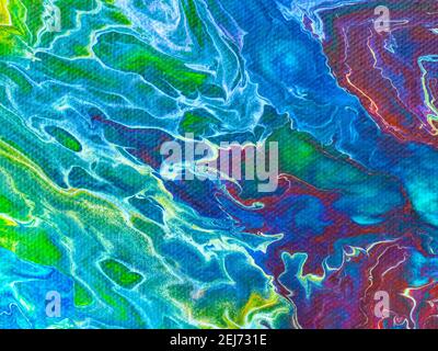 Beautiful abstract background. Pouring acrylic paint on canvas ...