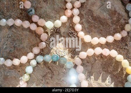Morganite stone beads bracelets with metal lotus pendant Stock Photo ...