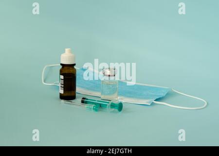 Vitamins and doctor s mask, corona virus protection concept on yellow ...