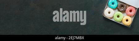 Chocolate donuts set, on black wooden table background Stock Photo - Alamy