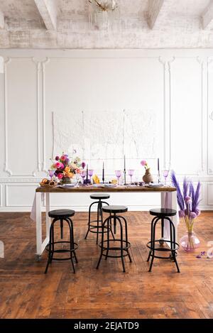 Summer table setting with pink peony flowers on rustic background with ...