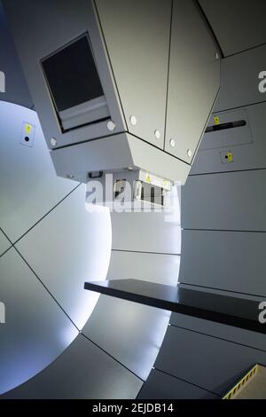 Proton therapy irradiates cancer cells with a beam of protons inside ...