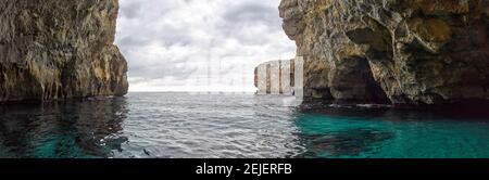 The Blue Grotto of Malta, rock formation on the sea with crystal clear ...