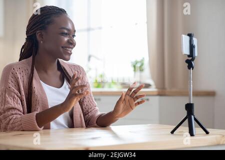 Young african american woman recording video tutorial at home Stock ...