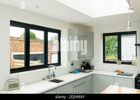 A modern typical house which has been renovated with white render and ...