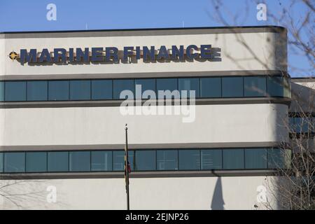 A logo sign outside of the headquarters of Mariner Finance in Baltimore ...