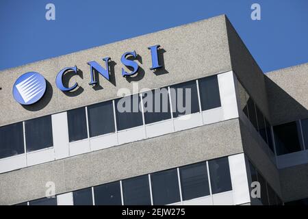 A logo sign outside of the headquarters of CNSI in Rockville, Maryland ...