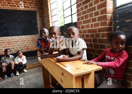 Rwandan primary school children in their classroom, Nyamata, Rwanda ...