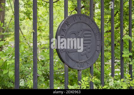 The logo of Fudan University, a major public research university, is ...