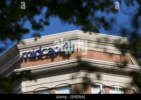 A logo sign outside of the headquarters of MidCap Financial Services in ...