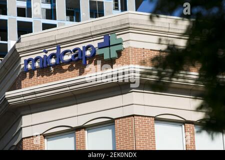A logo sign outside of the headquarters of MidCap Financial Services in ...