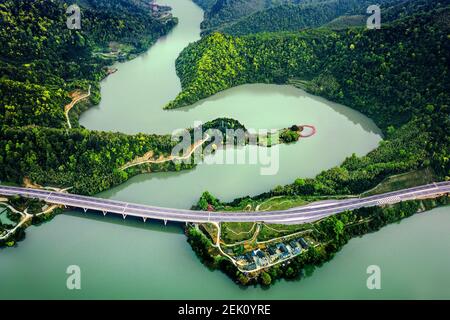 Aerial view of Meikou section of Ning Jing Yan Expressway in Guanxia ...